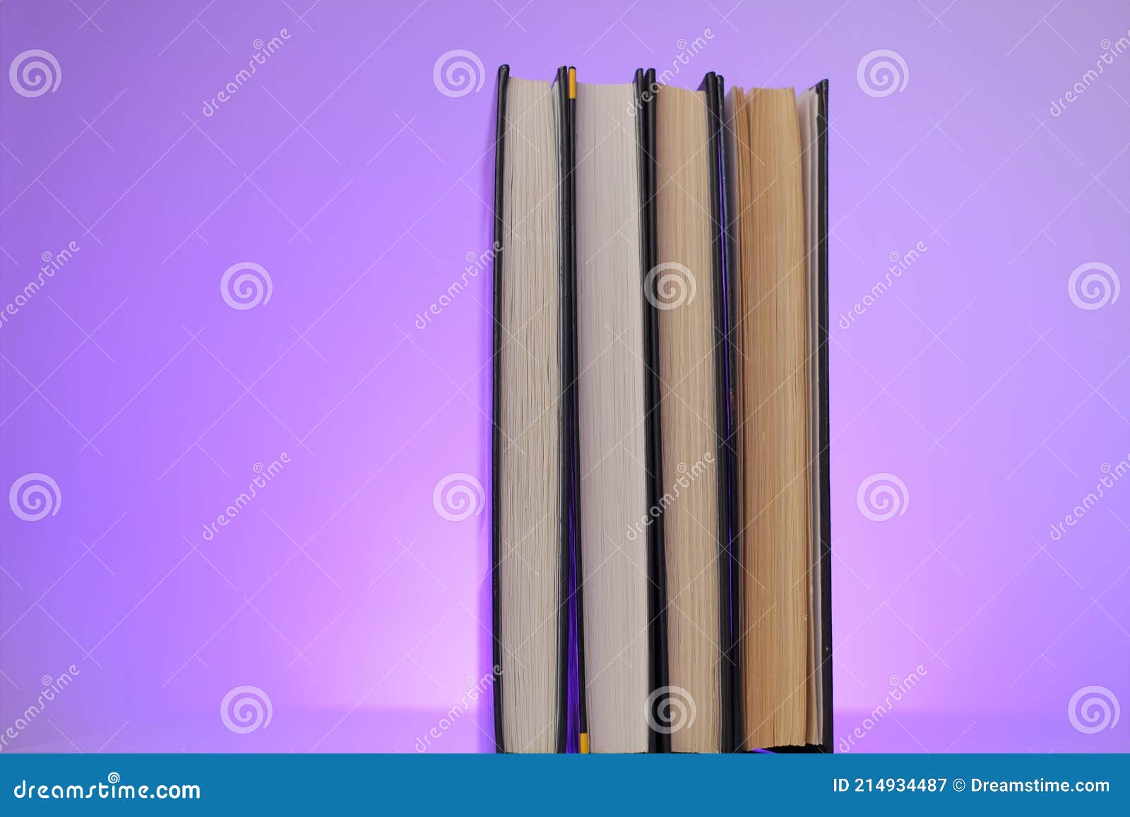 Books Stack on Purple Background.Reading Books.Learning and Knowledge ...