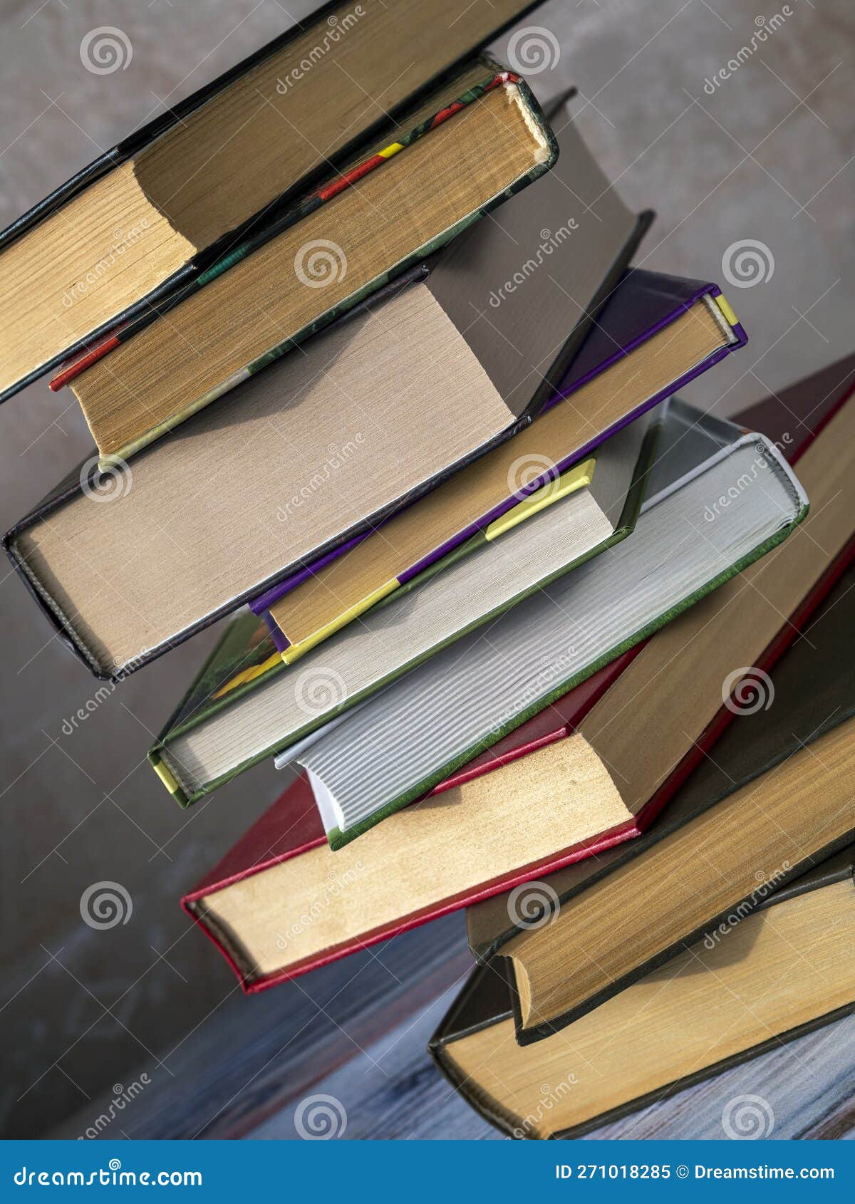 The Books are Stacked. the Stack of Books is at an Angle To the ...