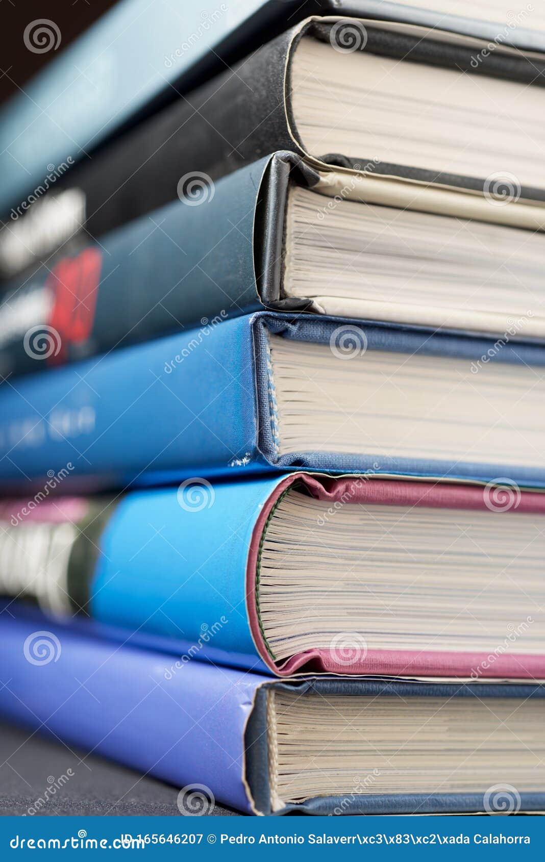 Books stacked view stock image. Image of collection - 165646207