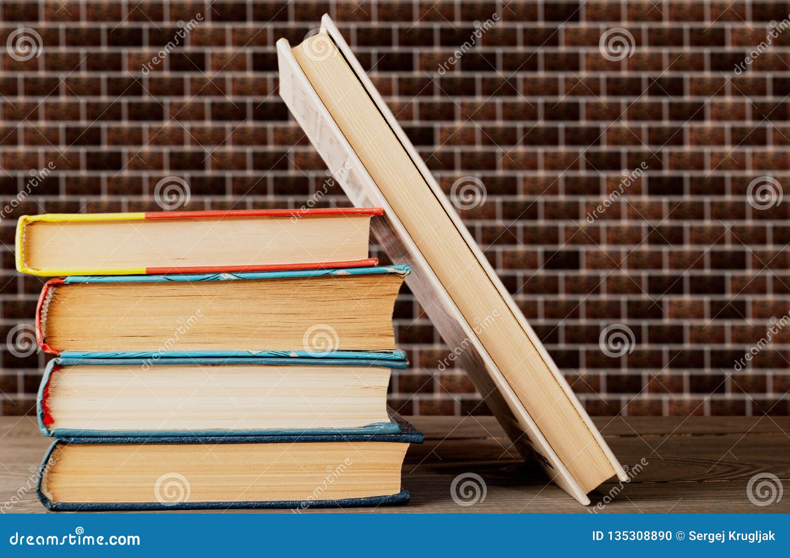 Books Stacked Vertically and One Book Near Stock Photo - Image of page ...