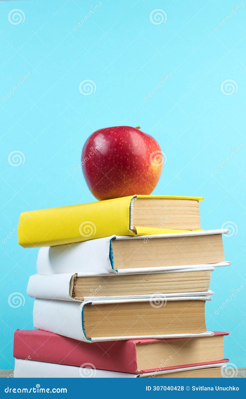 Books Stacking. Books on Wooden Table and Blue Background. Back To ...