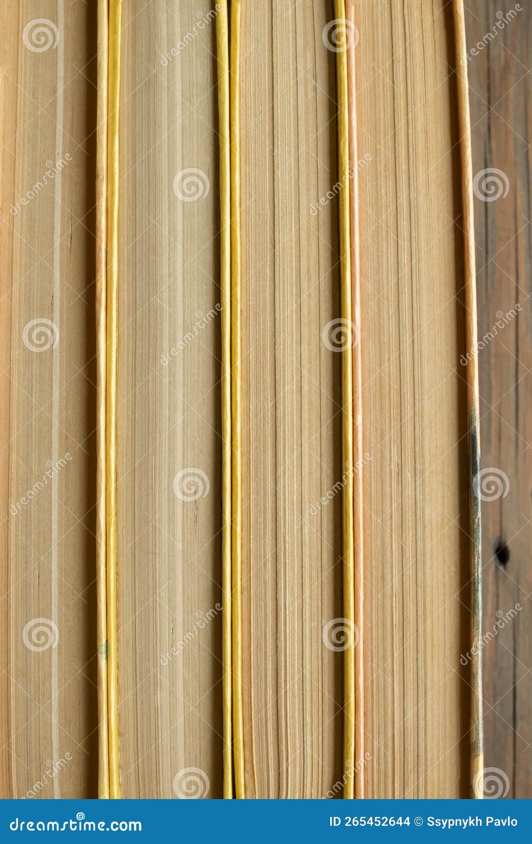 The Books Stand Close Together. a Stack of Books with Yellow Covers ...