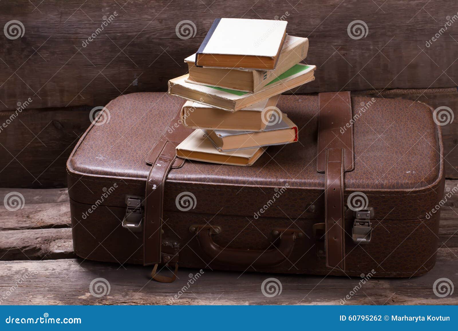Books on the suitcase. stock photo. Image of belt, clever - 60795262