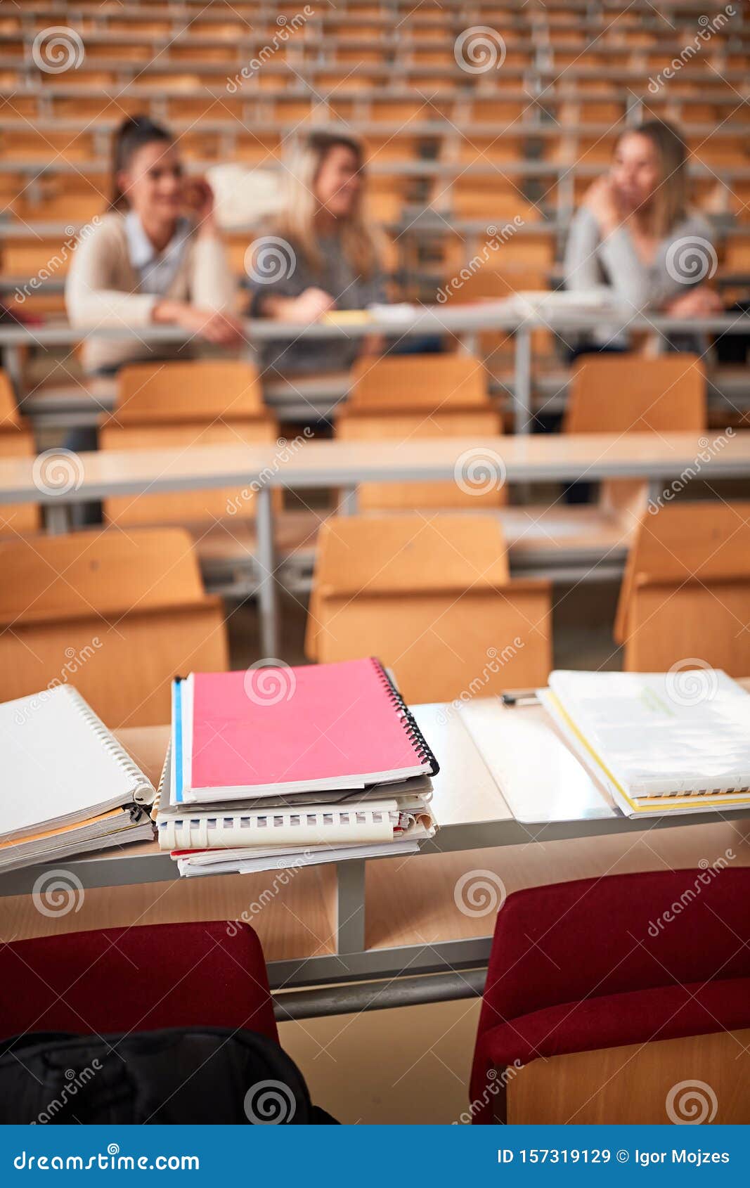 Books on Table in an Amphitheater Lecture Hall Stock Image - Image of ...