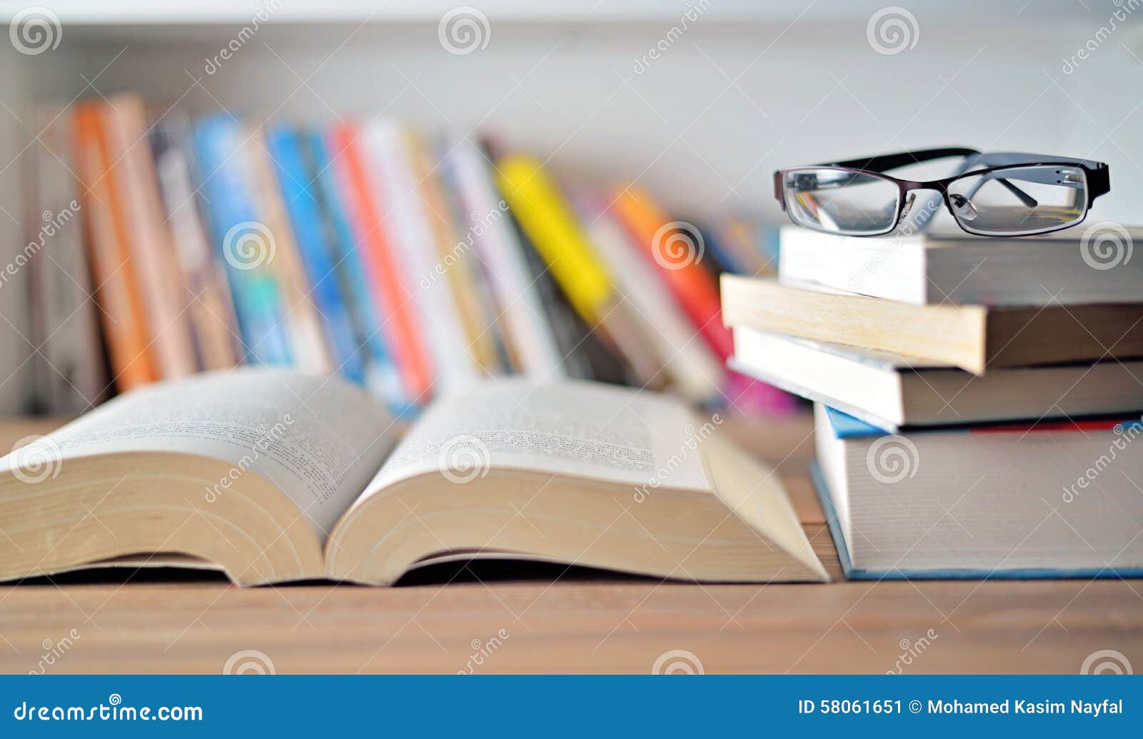 Books on table stock image. Image of pile, brown, reading - 58061651