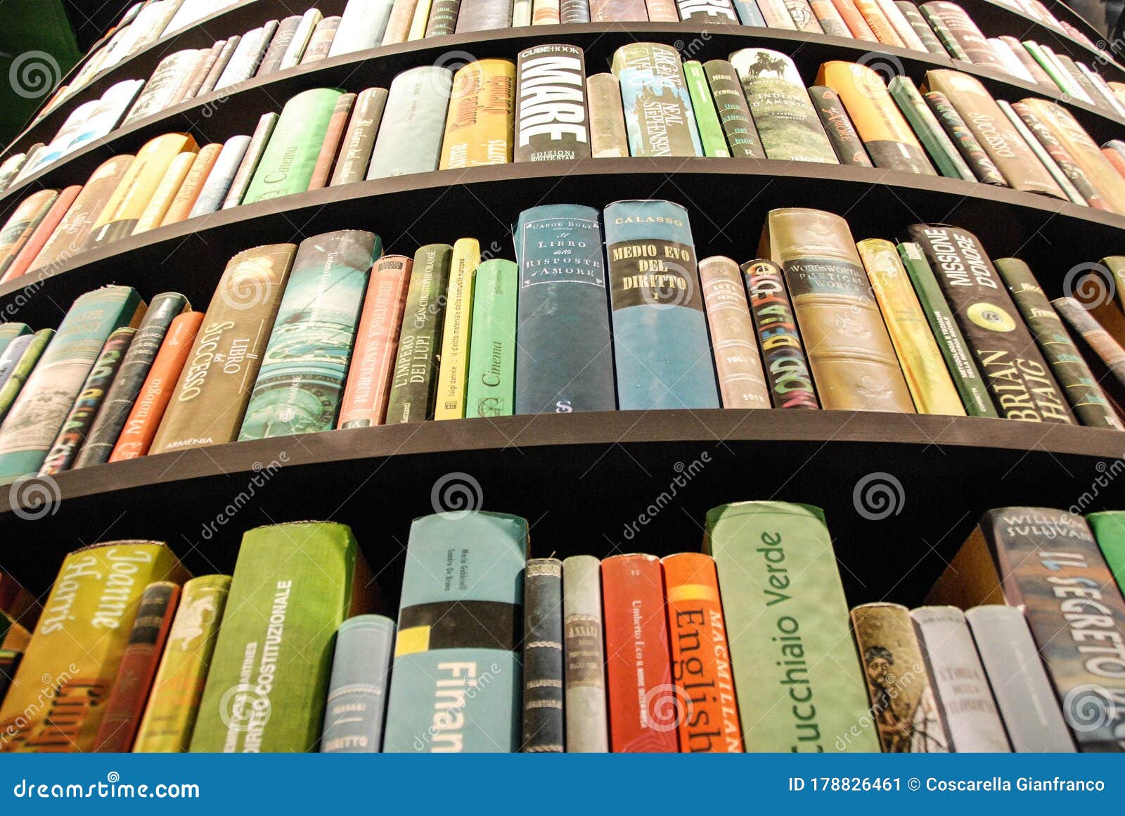 Books in a Tower-shaped Bookcase Editorial Photo - Image of design ...