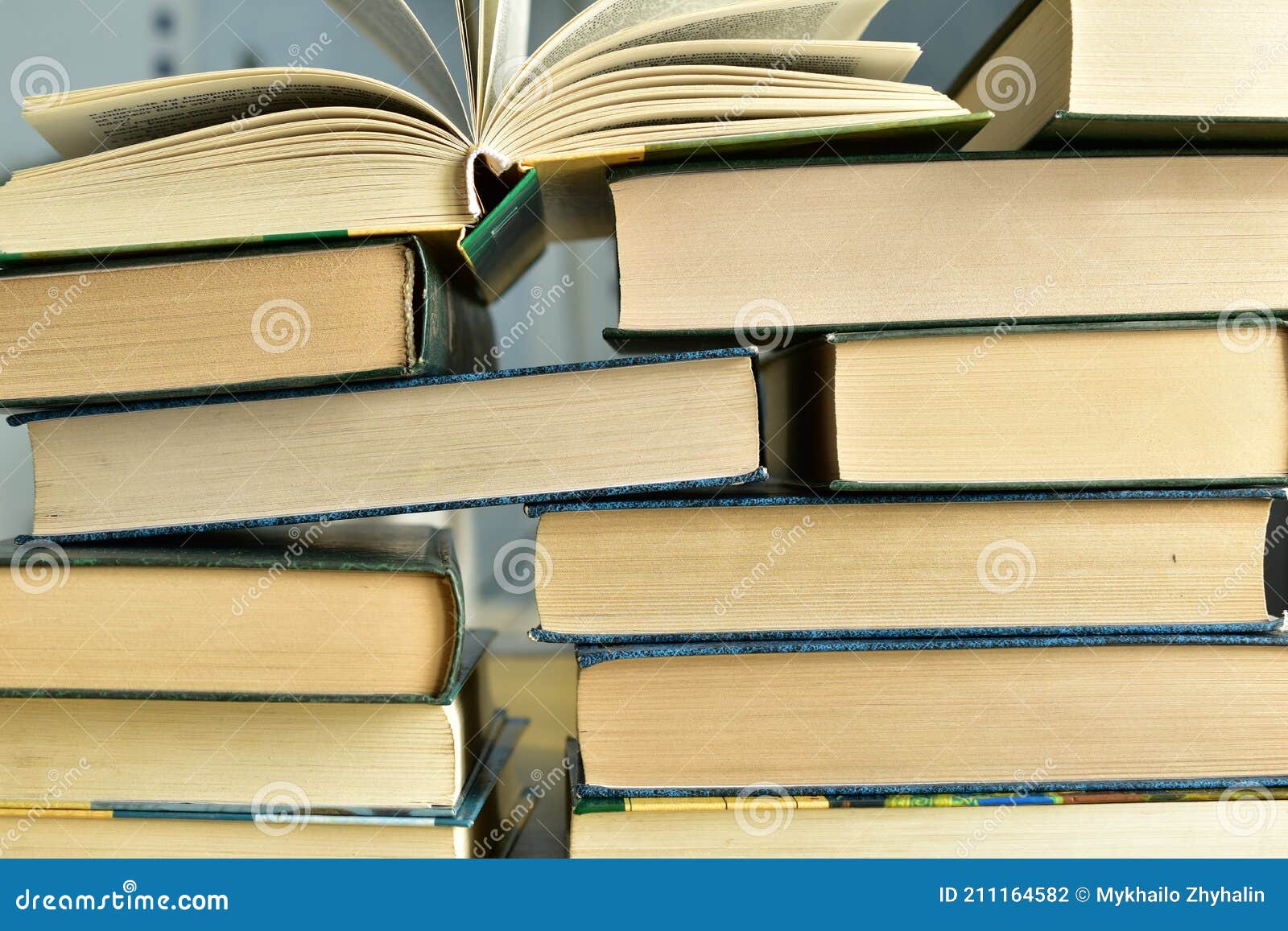 Close-up of Books Lying in Piles, Top Open. Stock Photo - Image of ...