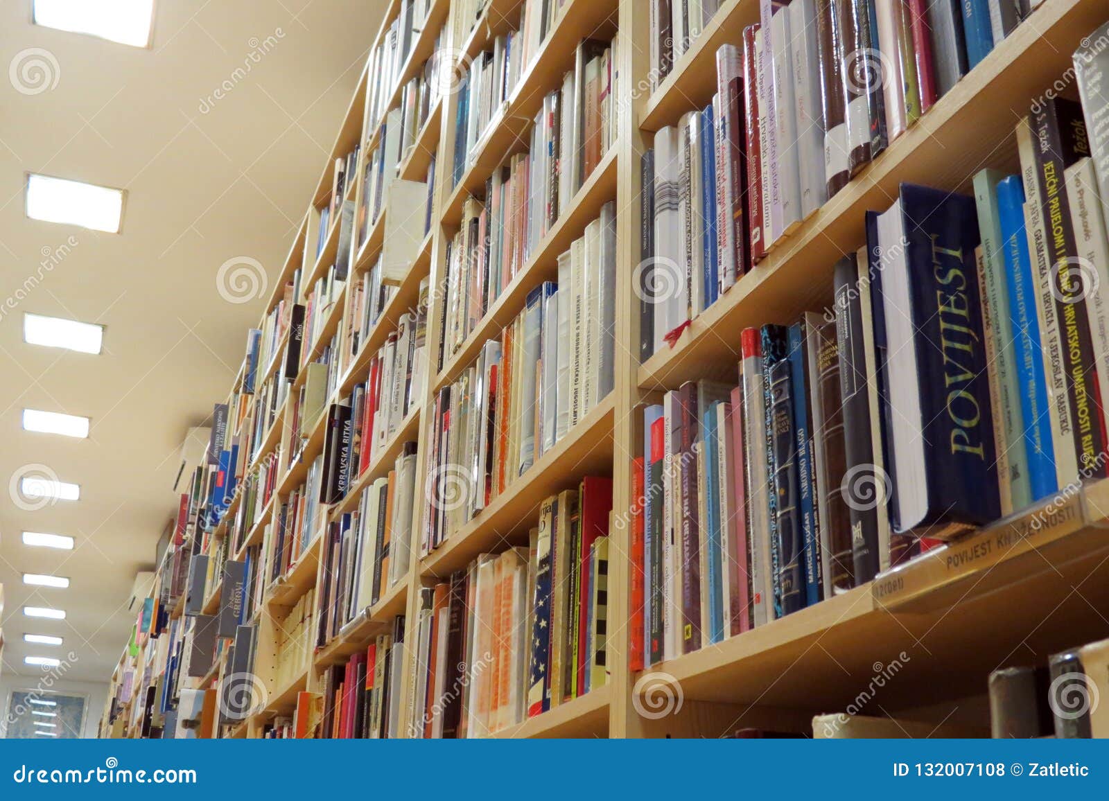 Bookshelf in library editorial stock photo. Image of bibliography ...