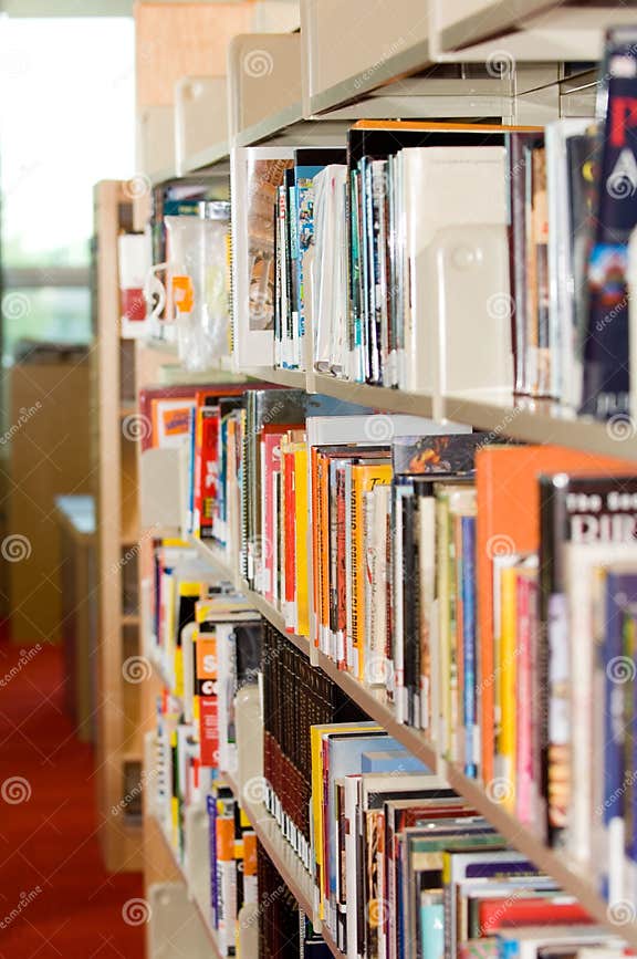 A bookshelf in a library stock photo. Image of book, shelf - 7390074