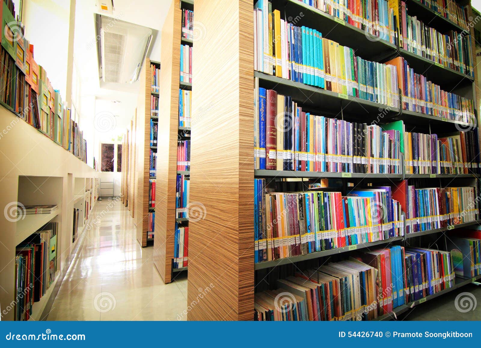 Bookshelf in library editorial image. Image of background - 54426740