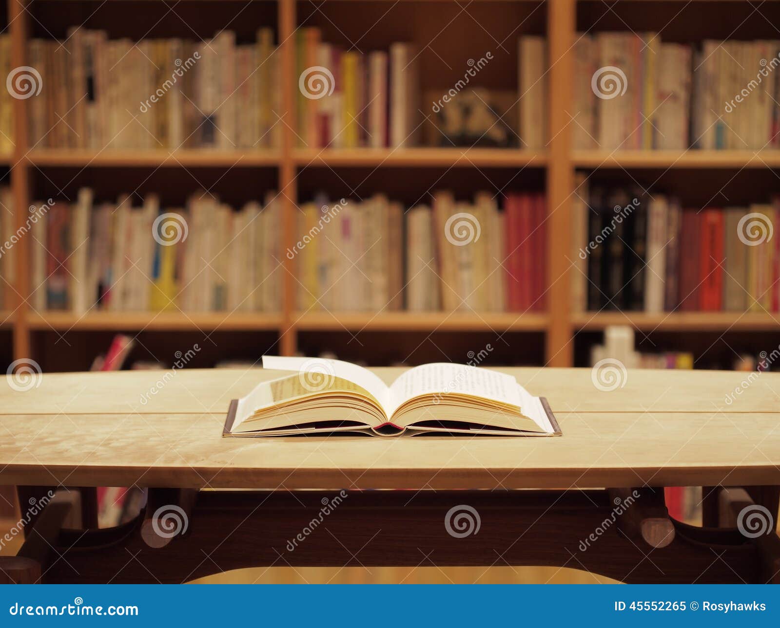 Bookshelf and an open book stock image. Image of wooden - 45552265