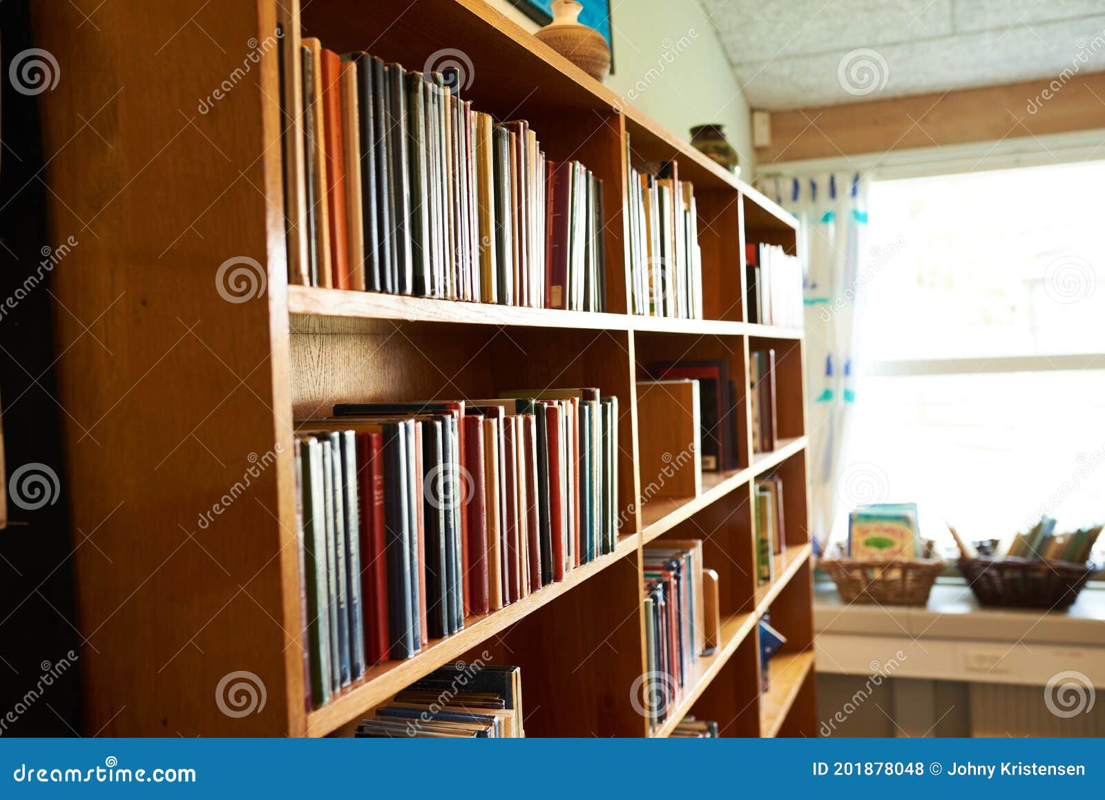 A Bookshelf at a School Library Stock Photo - Image of classroom ...
