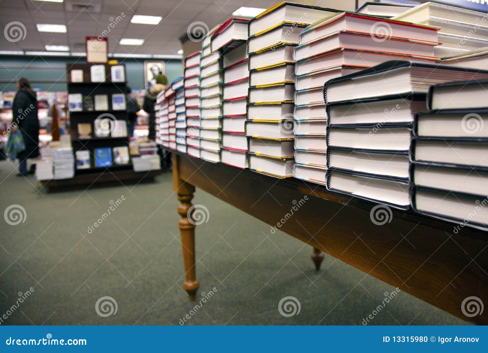 At the bookstore stock photo. Image of table, pile, stack - 13315980