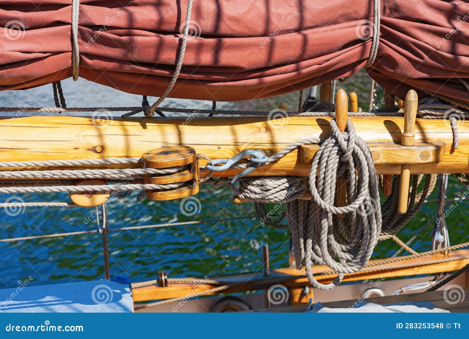 Boom with Blocks and a Red Sail on the Boat Editorial Stock Photo ...