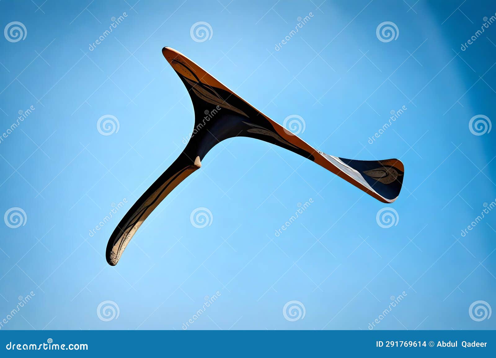 A boomerang in flight stock photo. Image of dart, flag - 291769614