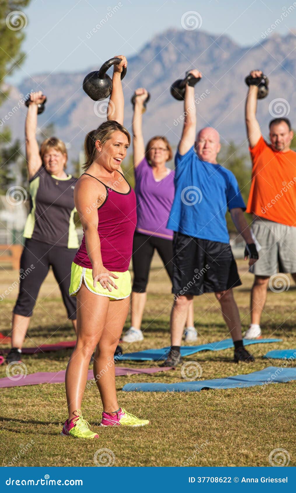 Boot Camp Exercise Class Lifting Weights Stock Photo - Image of mixed ...