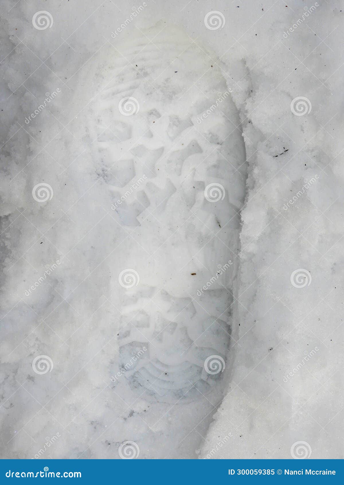 A Boot Tread Imprint Left in Winter Snow. Stock Image - Image of ...