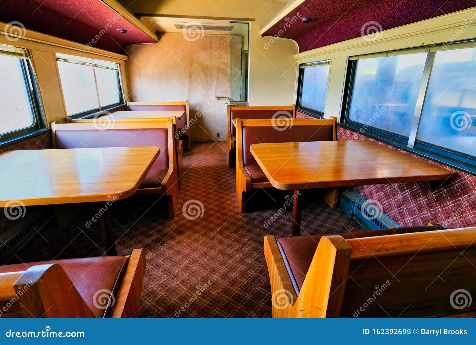 A Red Train Car With Booths And Tables. Generative AI Image. Royalty ...