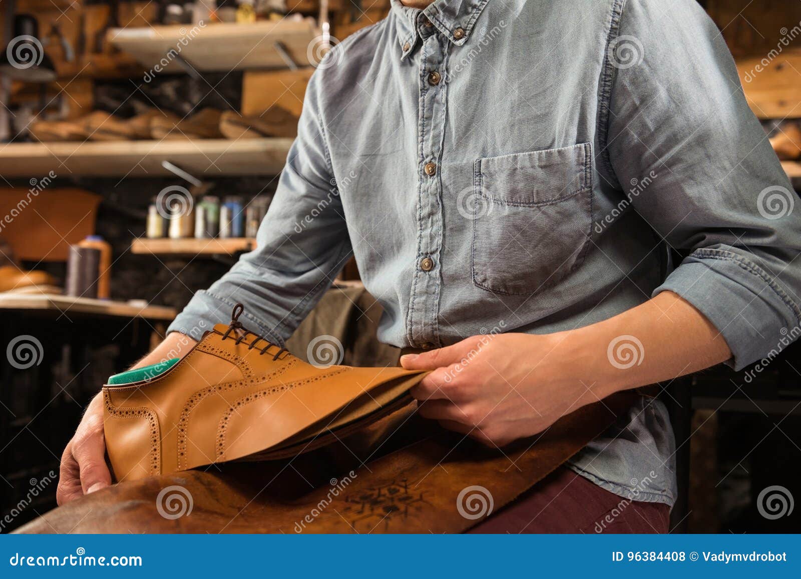 Bootmaker Sitting in Workshop Making Shoes Stock Photo - Image of ...