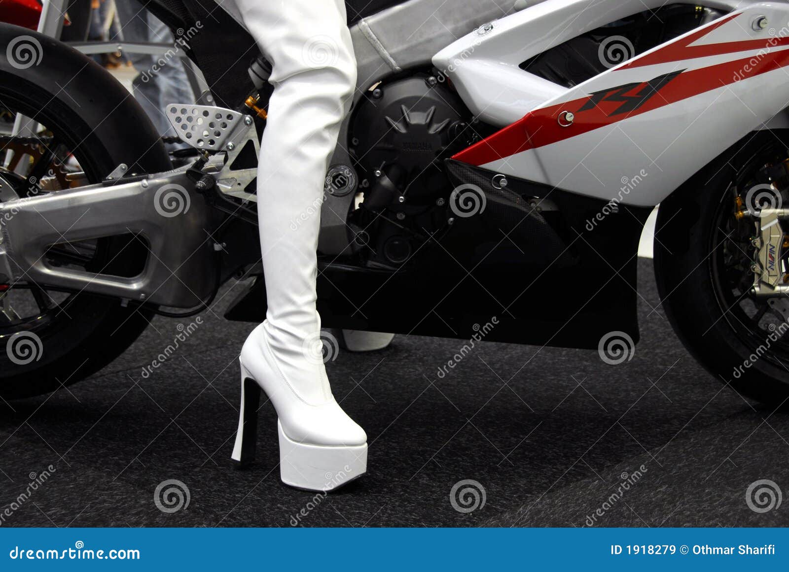 Boots and Bike stock image. Image of standing, boots, straddle - 1918279