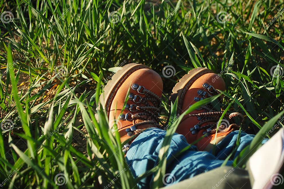 Boots in grass stock image. Image of relax, country, foots - 23299267