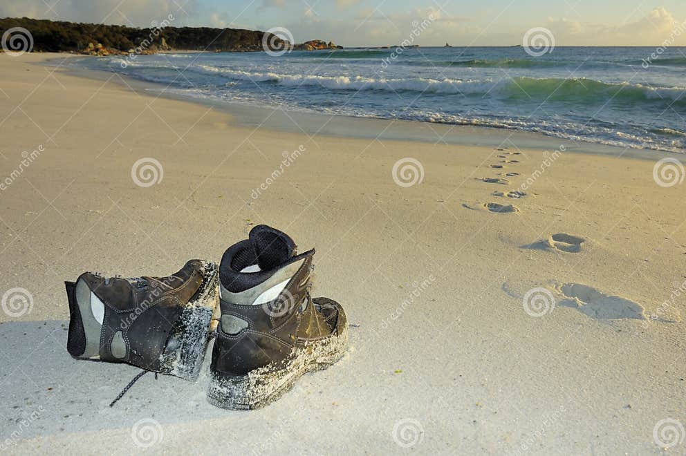 Boots left on the beach stock photo. Image of marks, breaker - 5645286