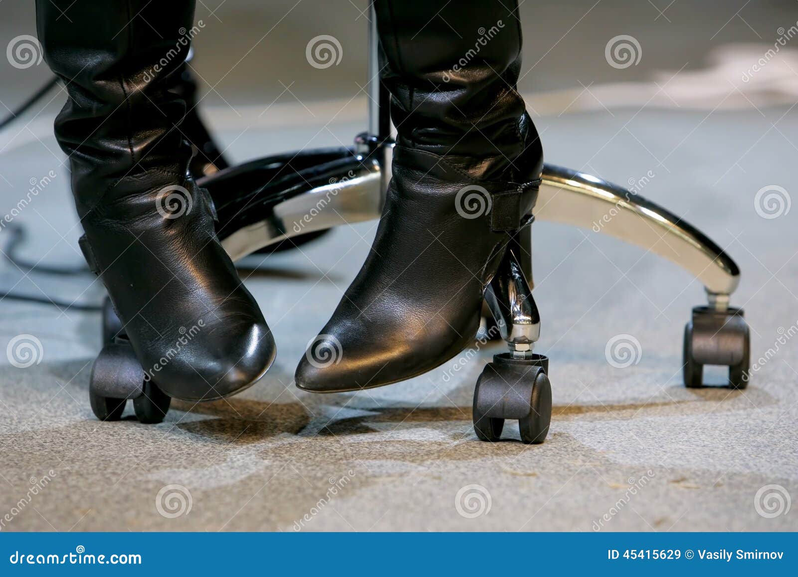 Boots and office chair stock image. Image of armchair - 45415629
