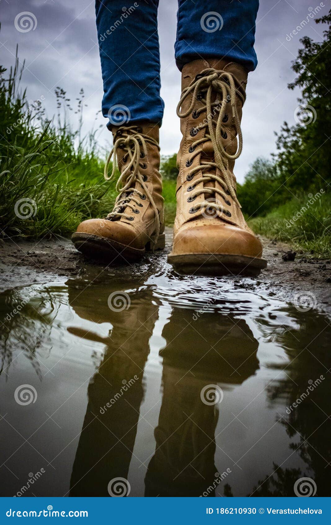 Boots is Walking in a Puddle Stock Photo - Image of splash, lifestyle ...