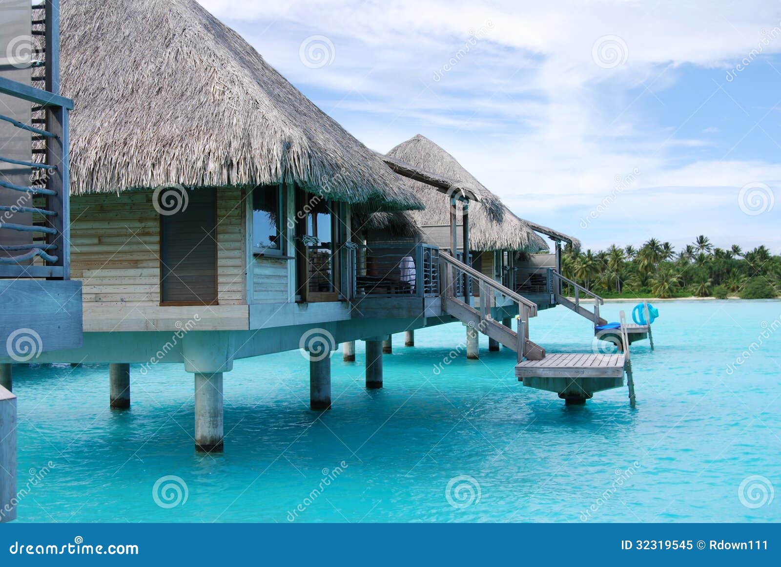 Bora bora over water huts stock image. Image of poolside - 32319545