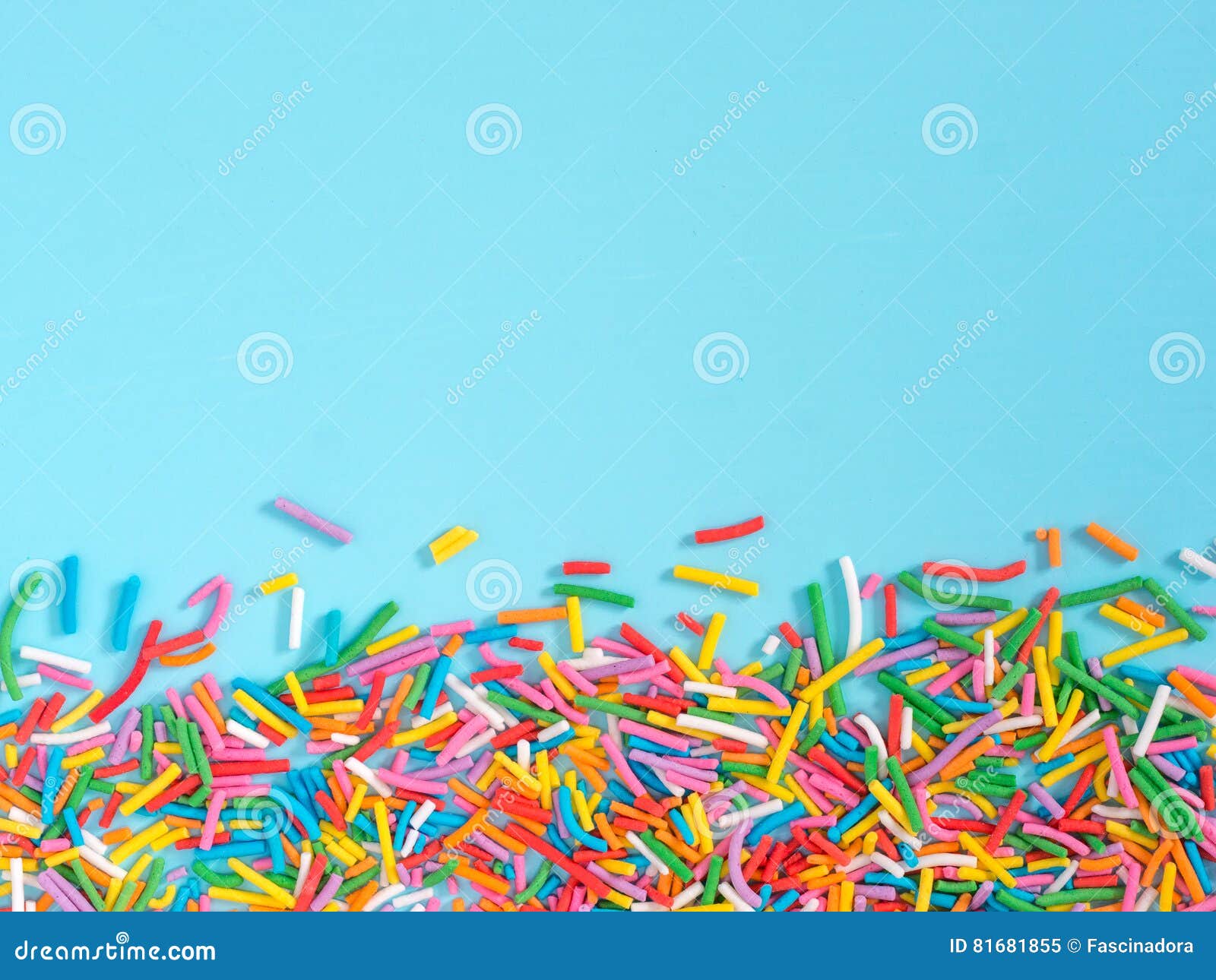 Border Frame of Colorful Sprinkles on Blue Background Stock Image ...
