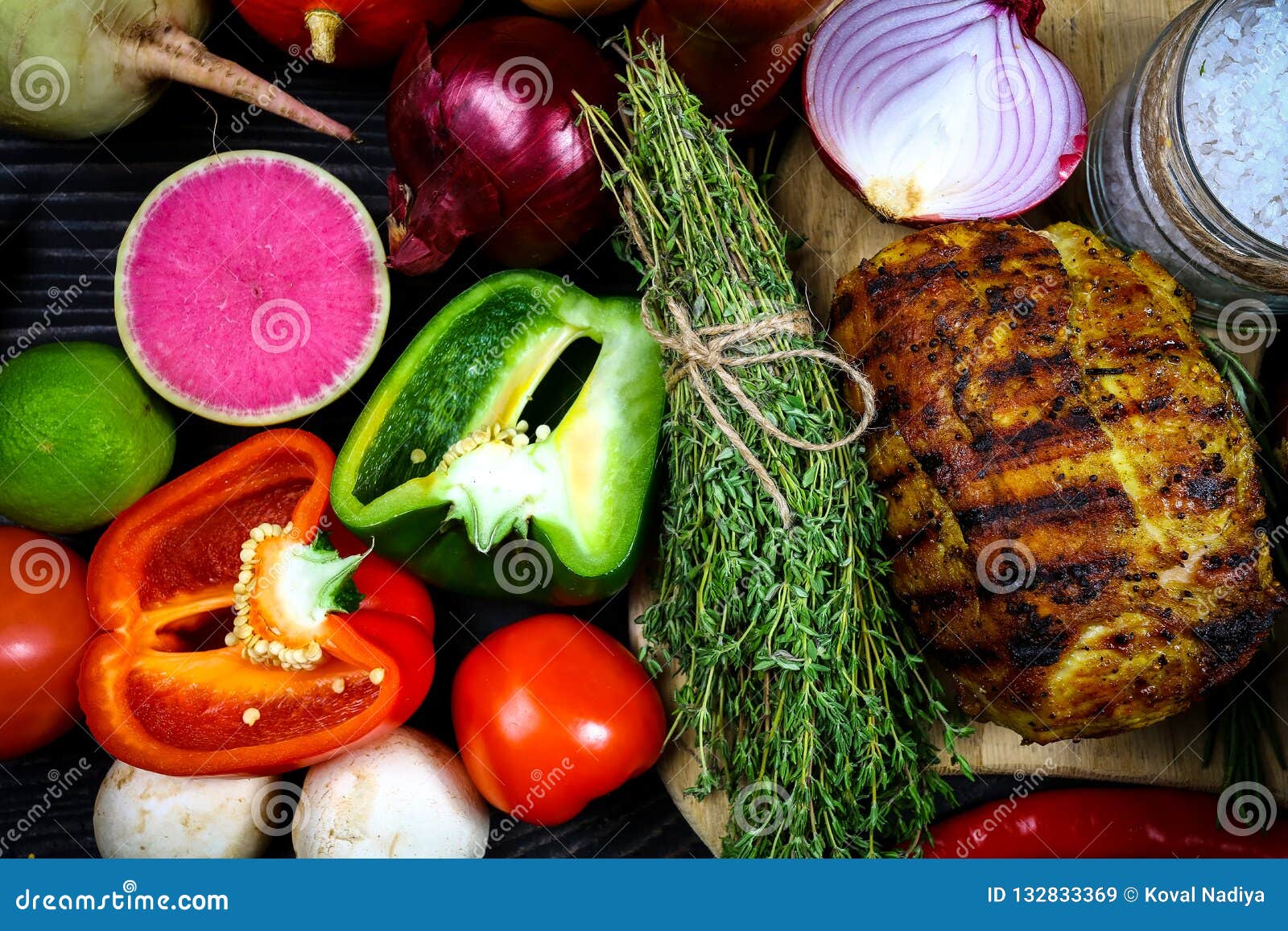 Border of Grilled Meat with Spices and Vegetables on Rustic Table with ...