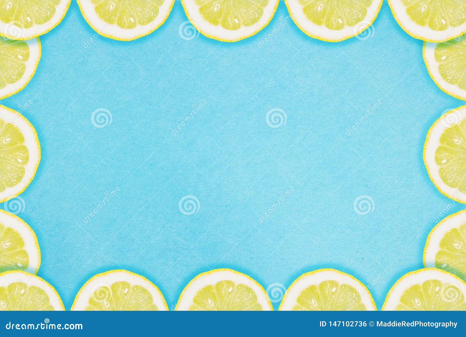 Border of Lemon Slices on a Blue Background. Stock Photo - Image of ...
