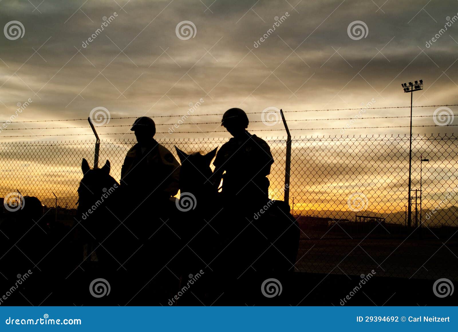 Border Patrol stock photo. Image of silhouette, fence - 29394692