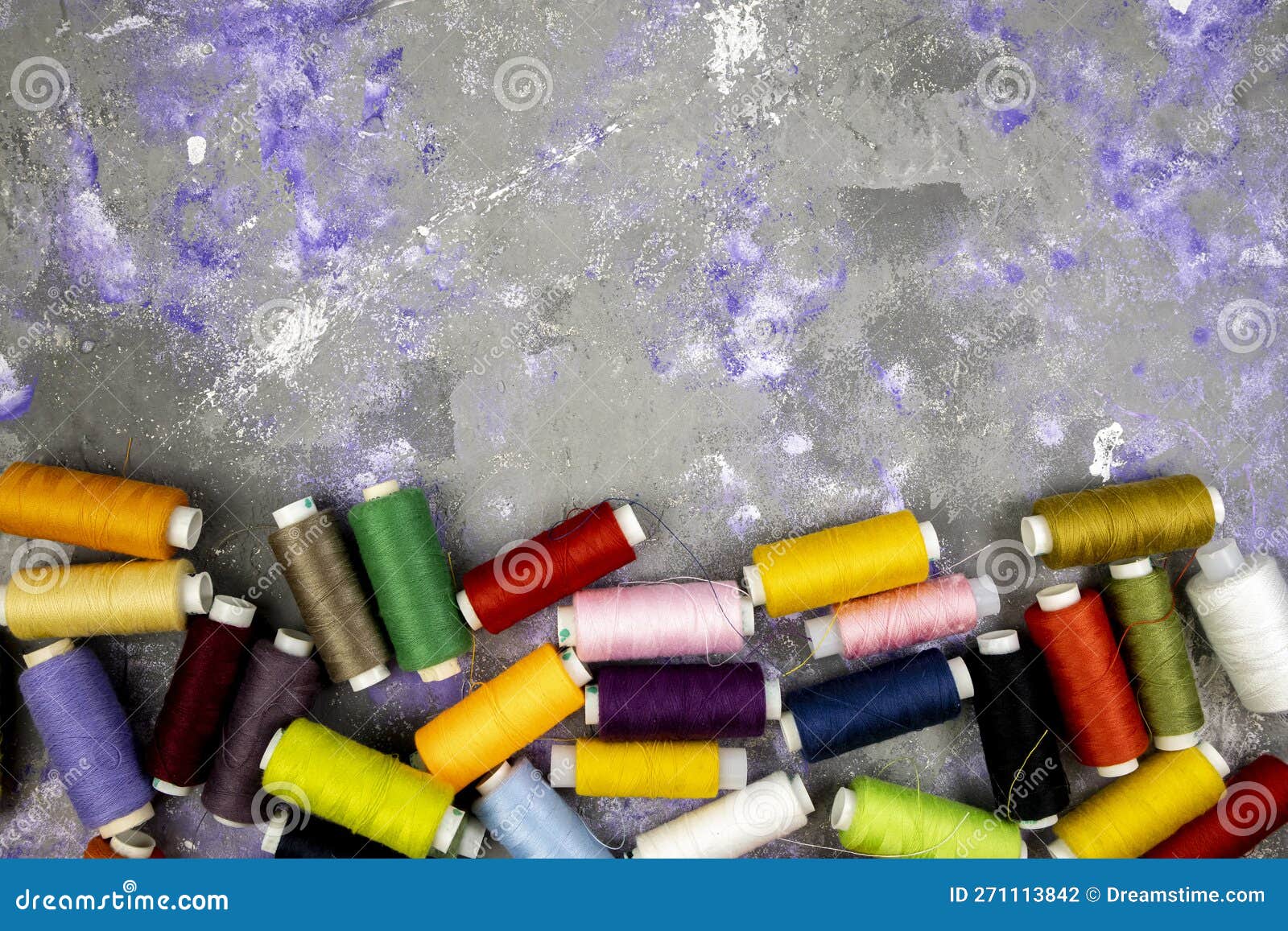 Border of Spools of Bright Threads on an Abstract Background, Flat Lay ...