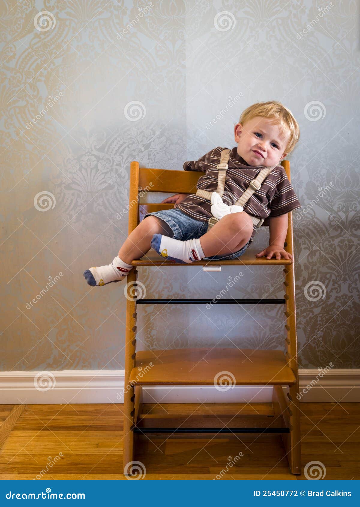 Bored baby in highchair stock photo. Image of patient - 25450772