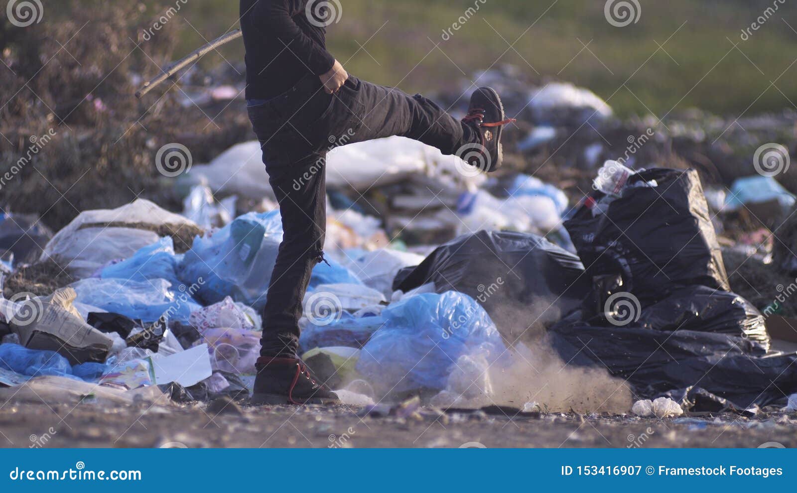 Bored Boy Making Dust in Dump Stock Image - Image of crouching, male ...