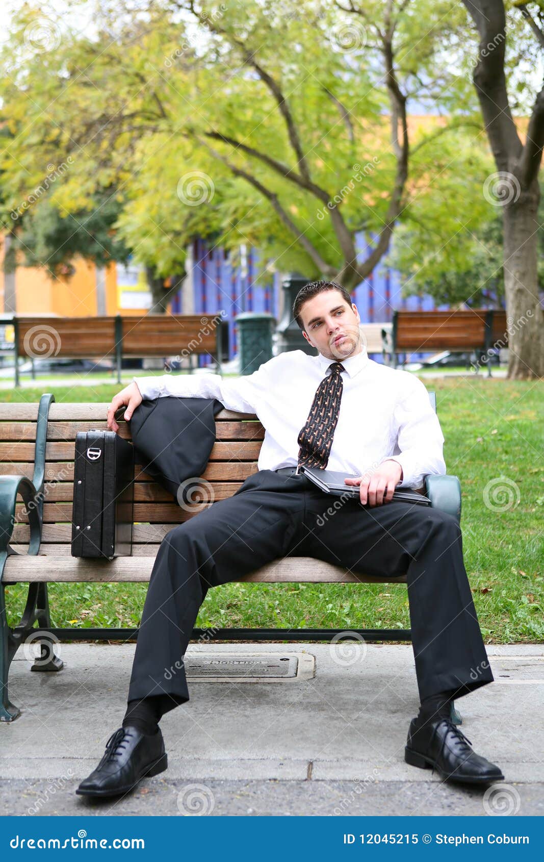 Bored Business Man on Bench Stock Image - Image of professional ...