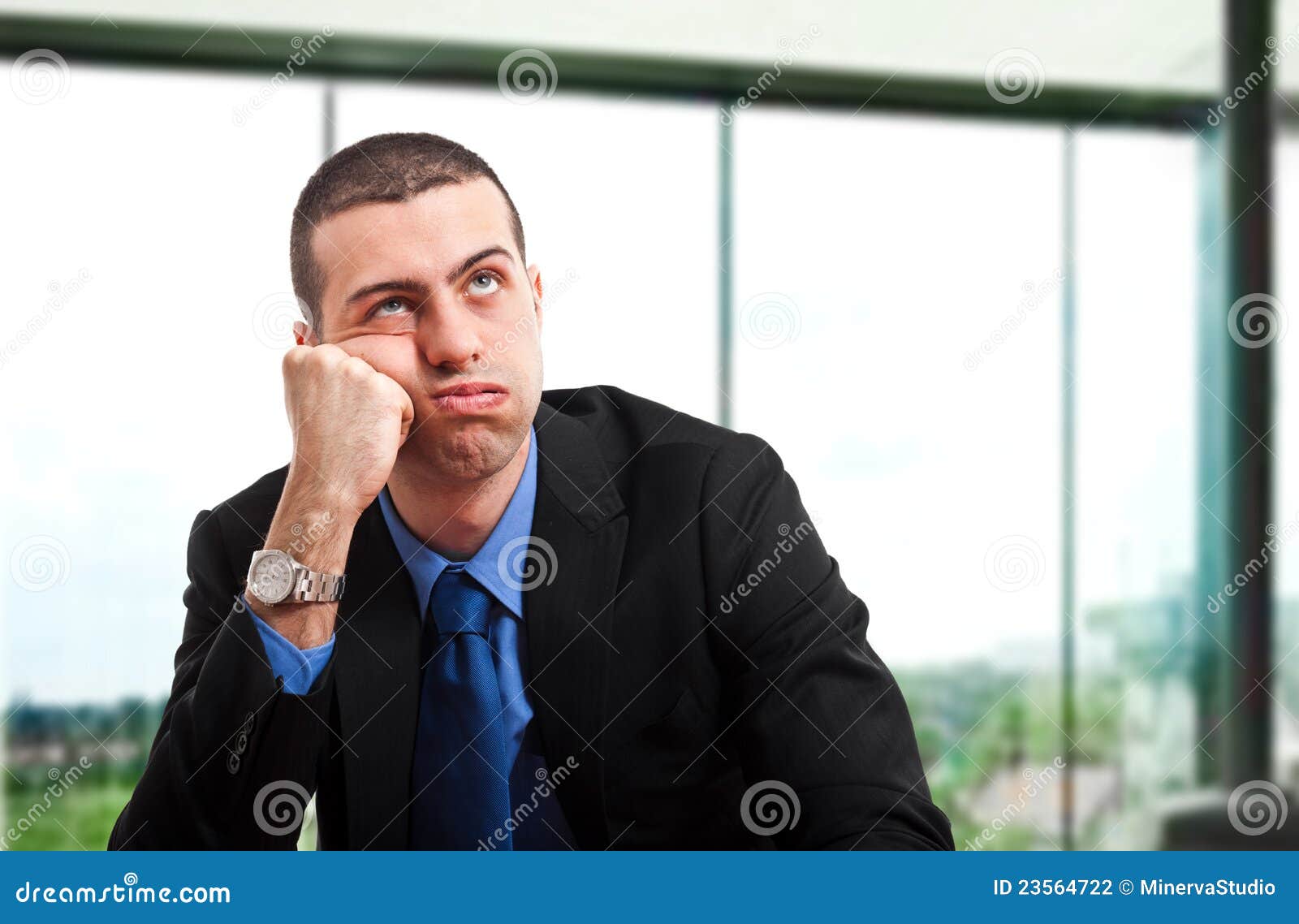 Bored businessman stock photo. Image of brunette, office - 23564722