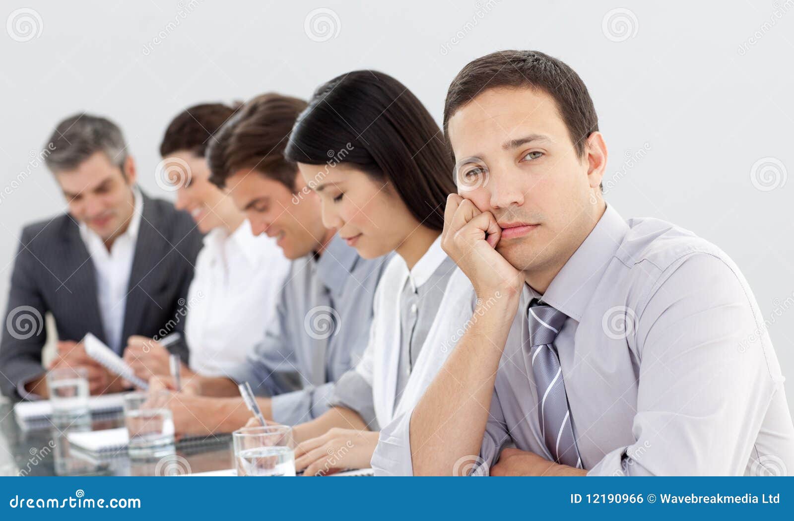 Bored Businessman in a Meeting Stock Photo - Image of multi, learning ...