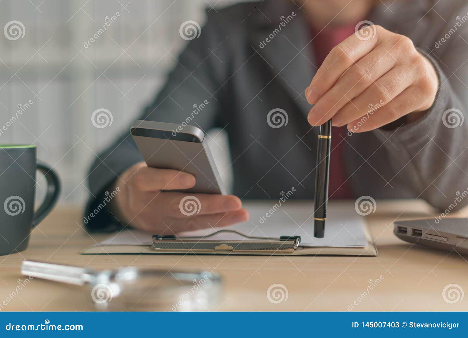 Bored Businesswoman Using Mobile Phone at Work Stock Image - Image of ...