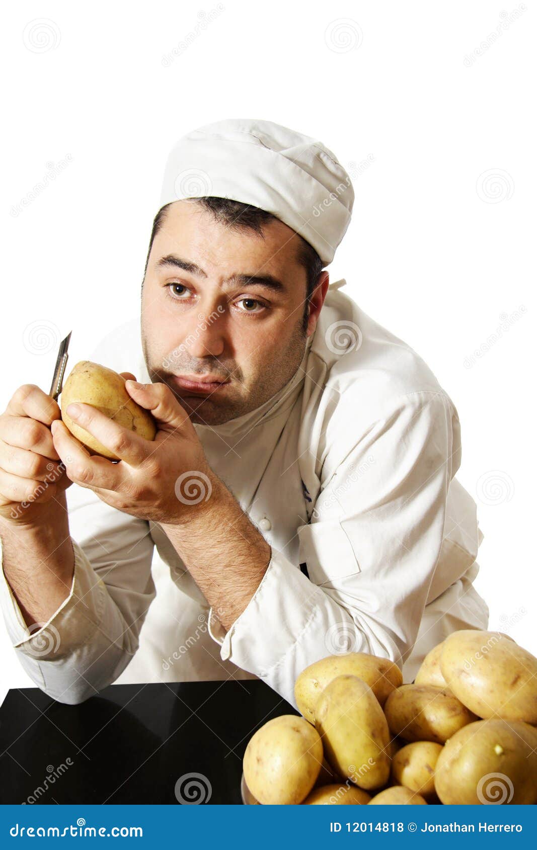 Bored Chef Peeling Potatoes Stock Photo - Image of kitchen, clothes ...
