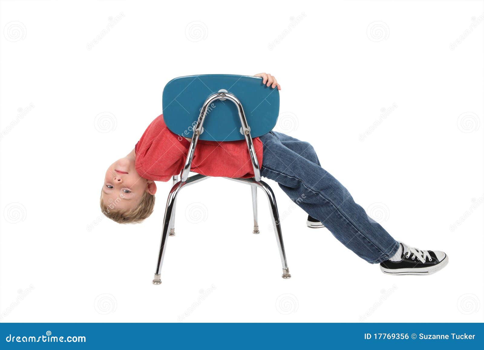 Bored Child Laying on Chair Stock Photo - Image of student, bored: 17769356
