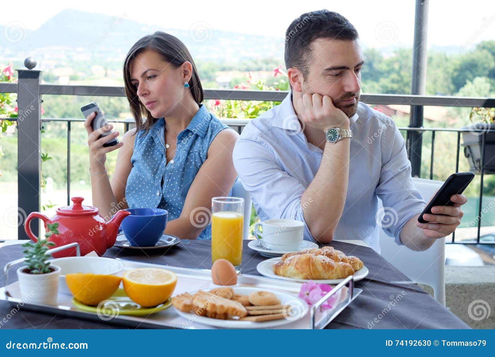 Bored Couple Using Smartphone Stock Photo - Image of couple, people ...