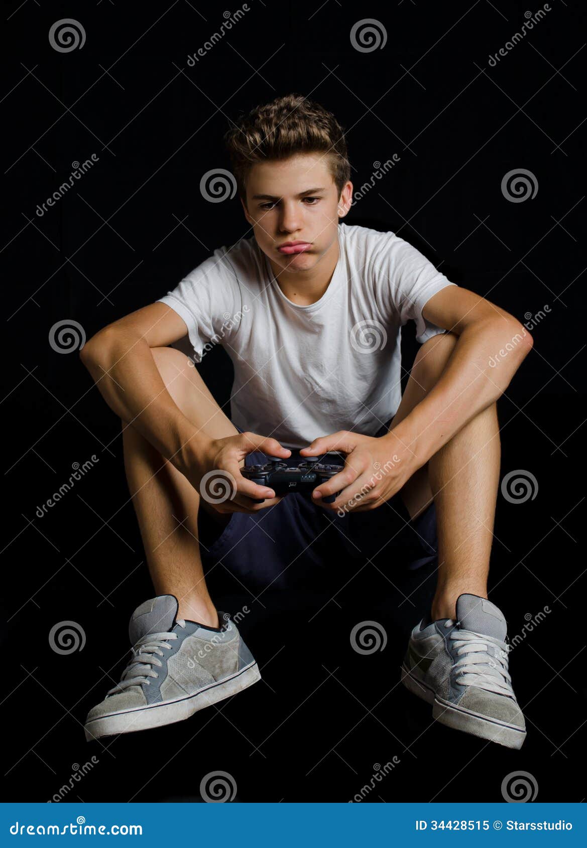 Bored or Disappointed Boy Playing Videogames Stock Image - Image of ...