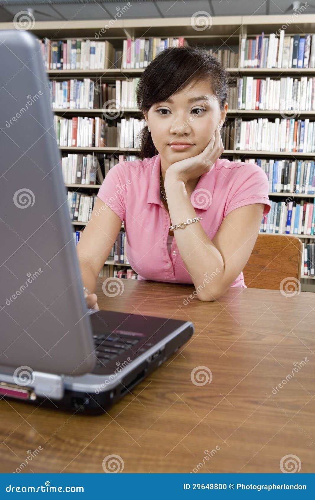 Bored Female Student Using Laptop Stock Photo - Image of boredom ...