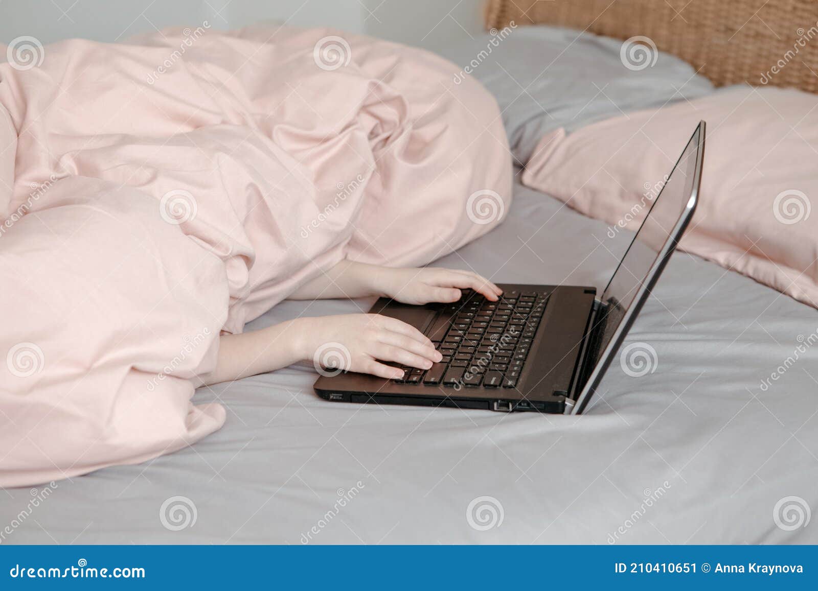 Bored Funny Child Lying in Bed Under Blanket and Learning in Virtual ...