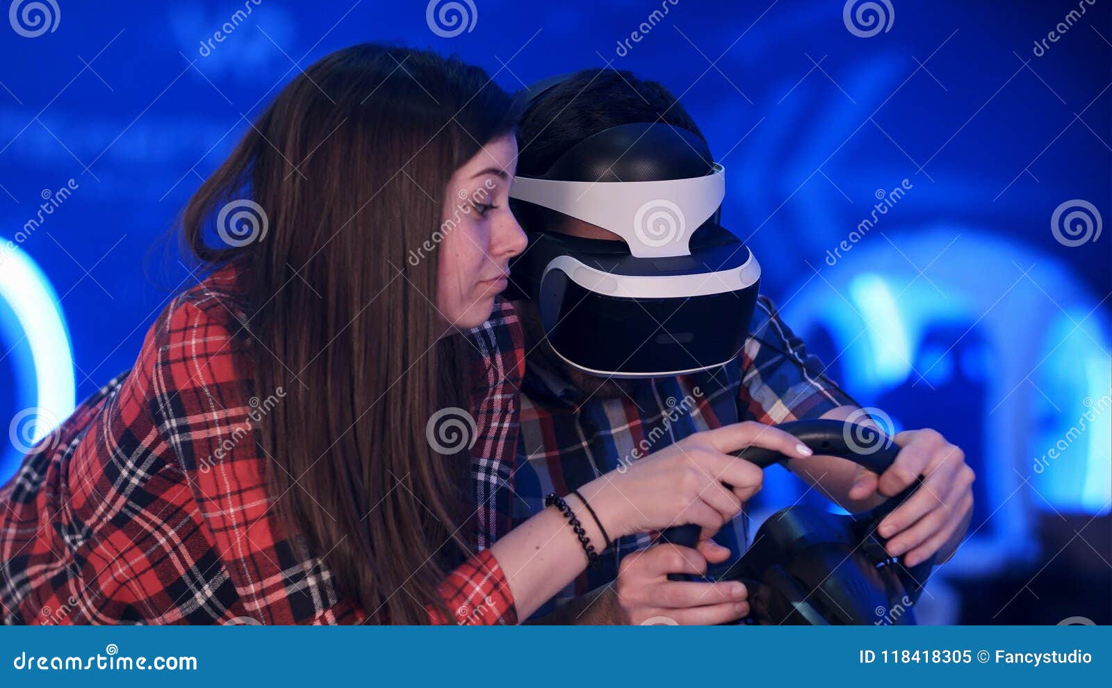 Bored Girl Trying To Distract Her Boyfriend From Playing Virtual Reality Racing Game Stock Image 1274