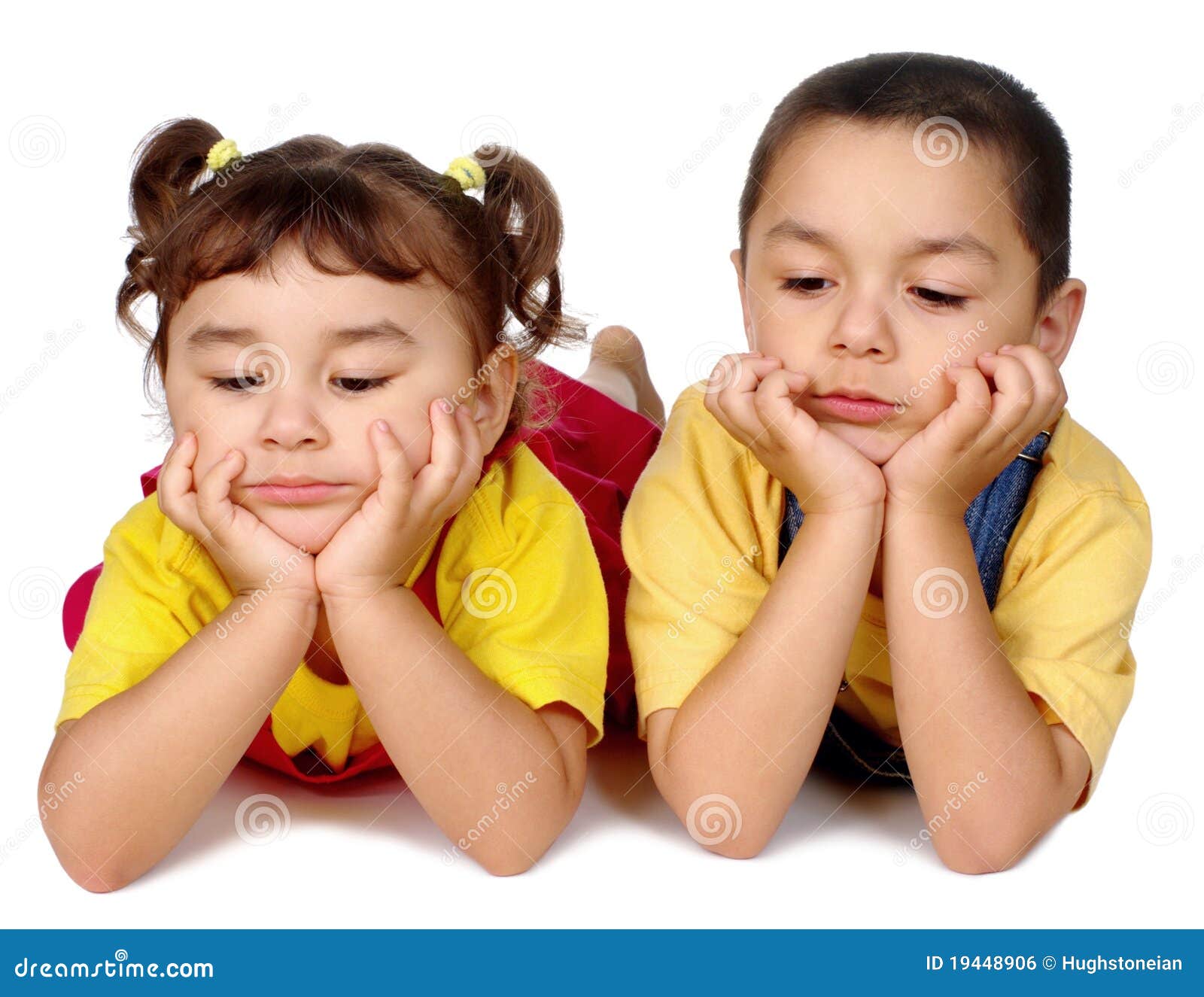 Bored kids looking down stock photo. Image of isolated - 19448906