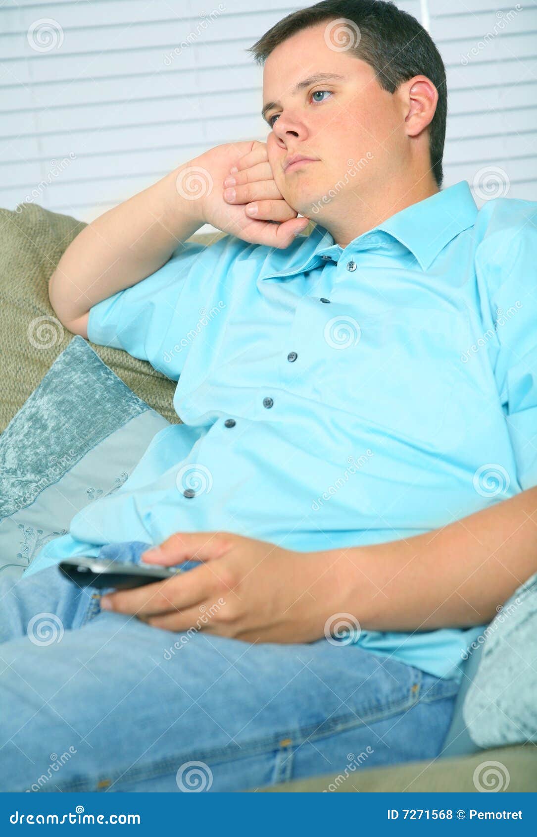 Bored Male Holding TV Remote Stock Photo - Image of entertainment ...