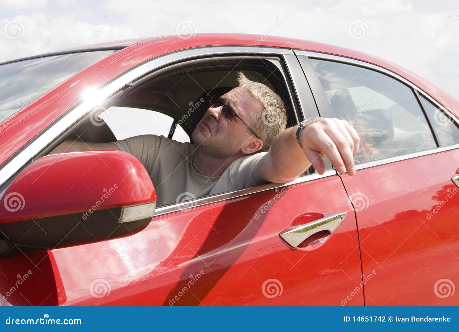 Bored man in red car stock photo. Image of young, sunglasses - 14651742